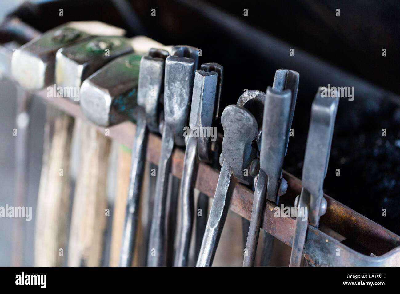 Tools of the blacksmith in blacksmith shop Stock Photo - Alamy