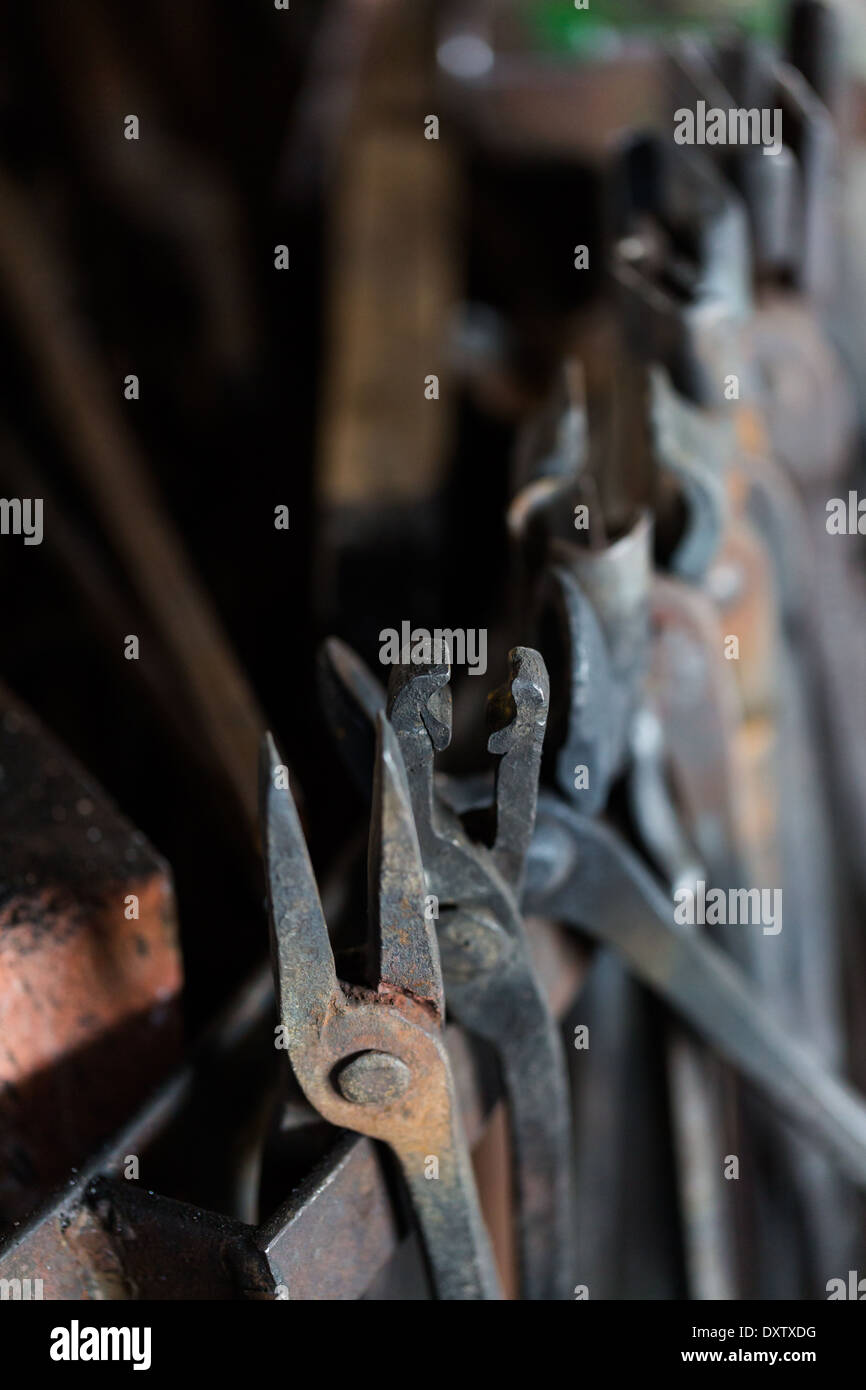 Tools of the blacksmith in blacksmith shop Stock Photo - Alamy