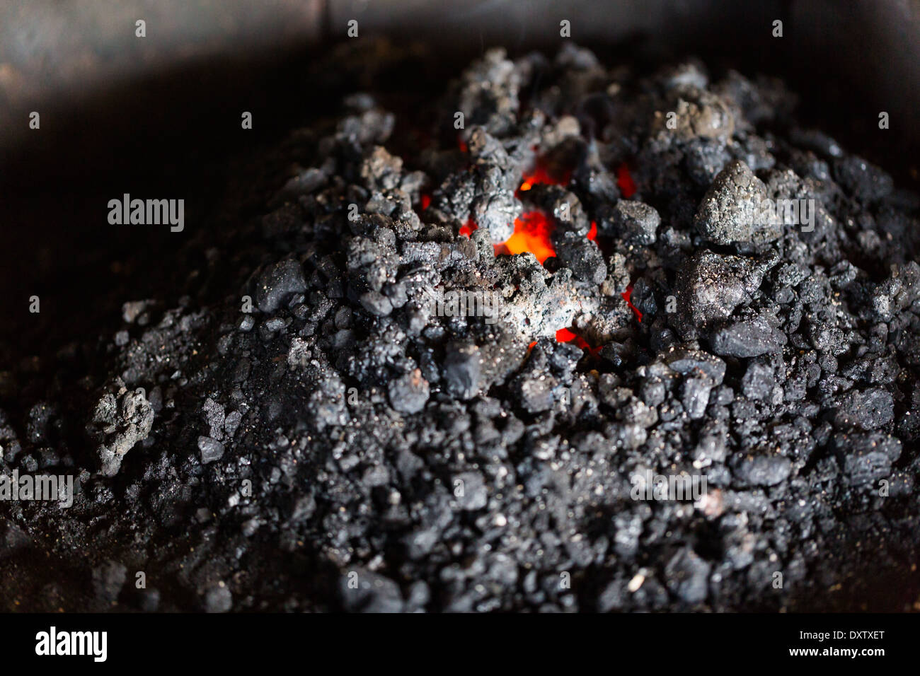 Coal in the forge of blacksmith shop Stock Photo - Alamy