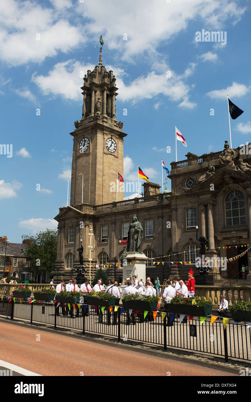 A group gathers outside the Edwardian Town Hall; South Shields, Tyne ...