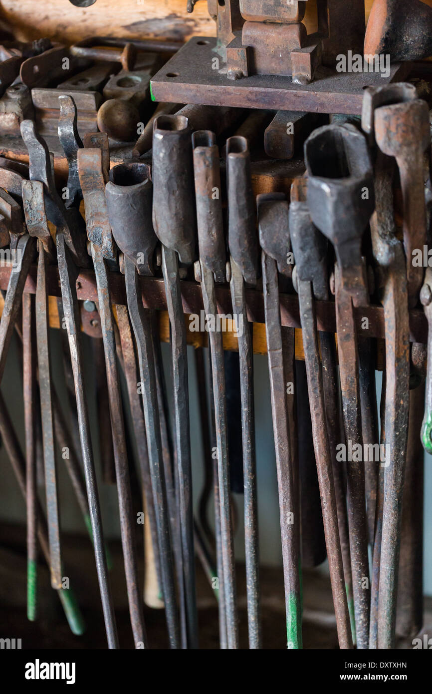 Tools of the blacksmith in blacksmith shop Stock Photo - Alamy