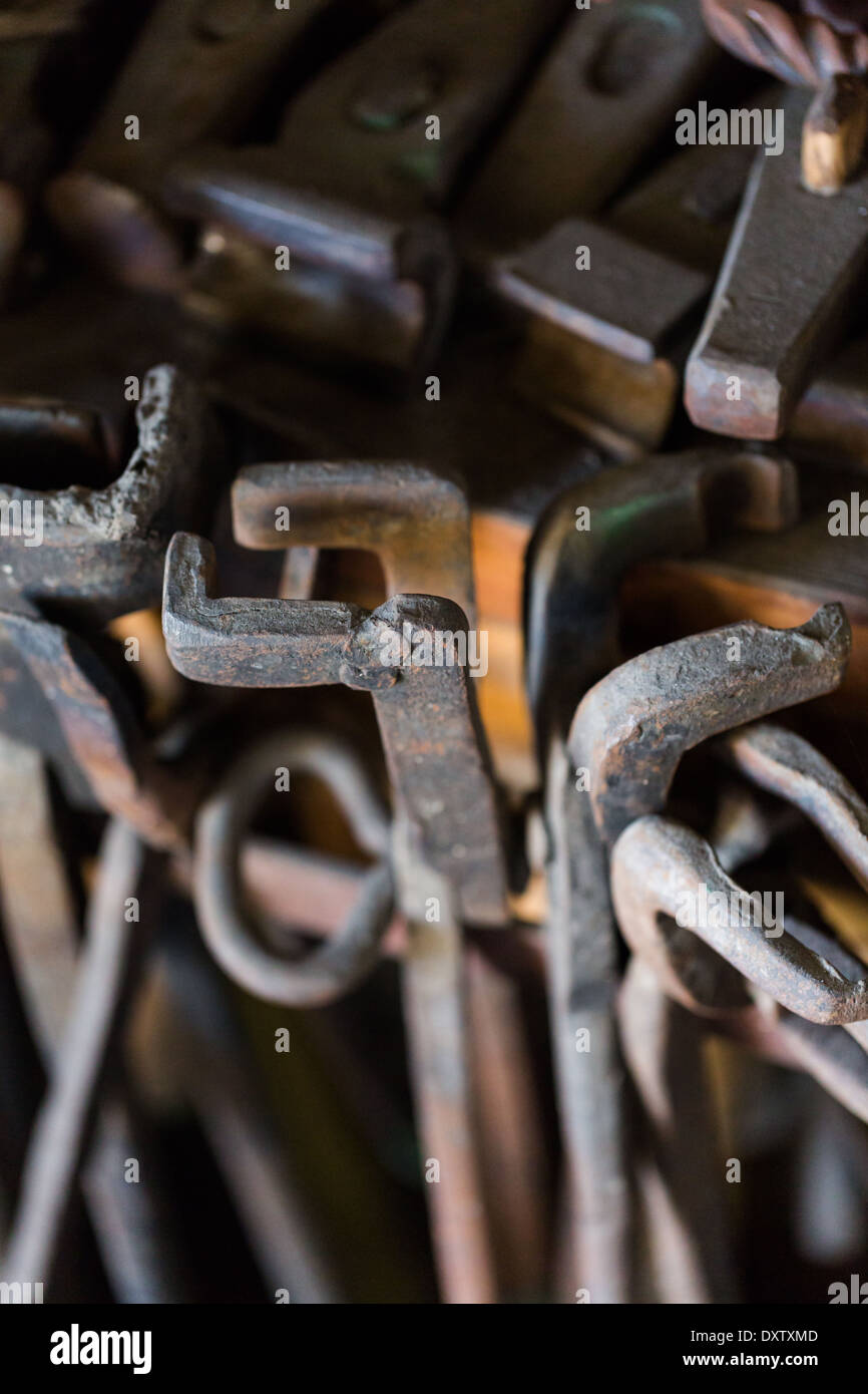 Tools of the blacksmith in blacksmith shop Stock Photo - Alamy