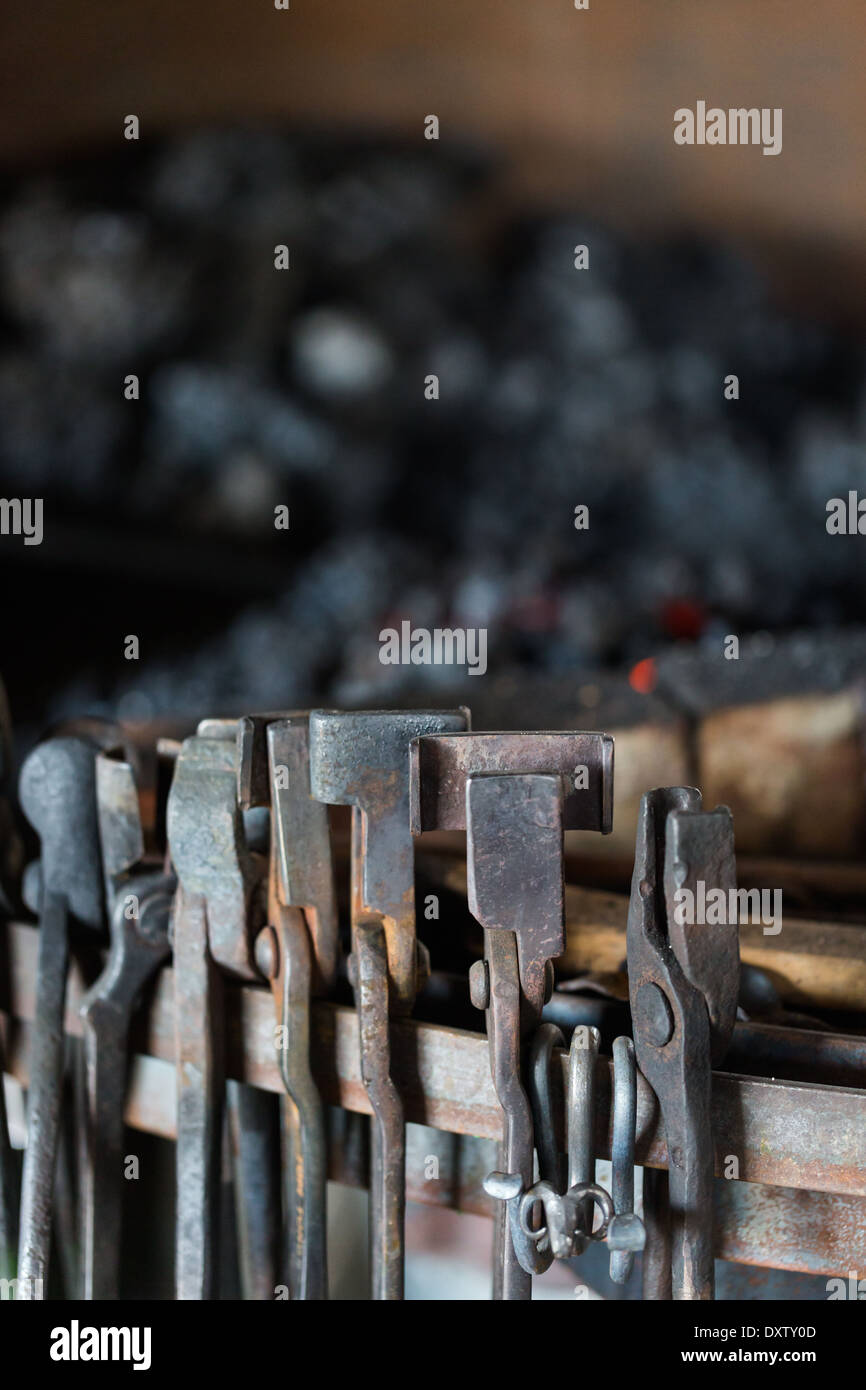 Tools of the blacksmith in blacksmith shop Stock Photo - Alamy