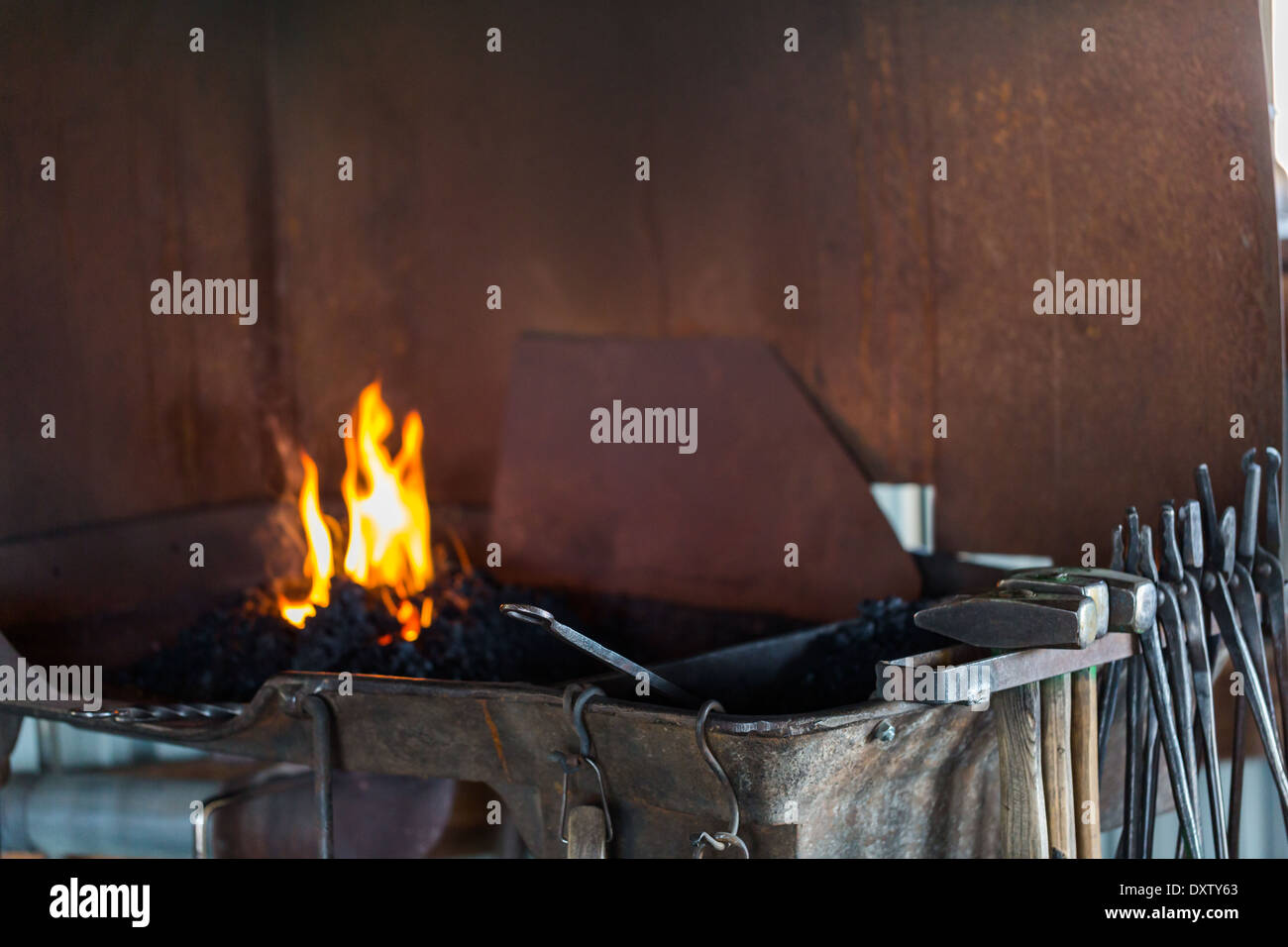 Working forge of the blacksmith in old shop Stock Photo - Alamy