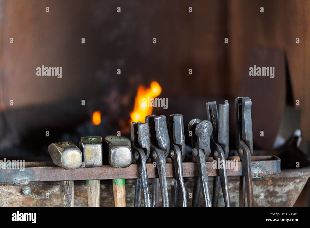 Working forge of the blacksmith in old shop Stock Photo - Alamy