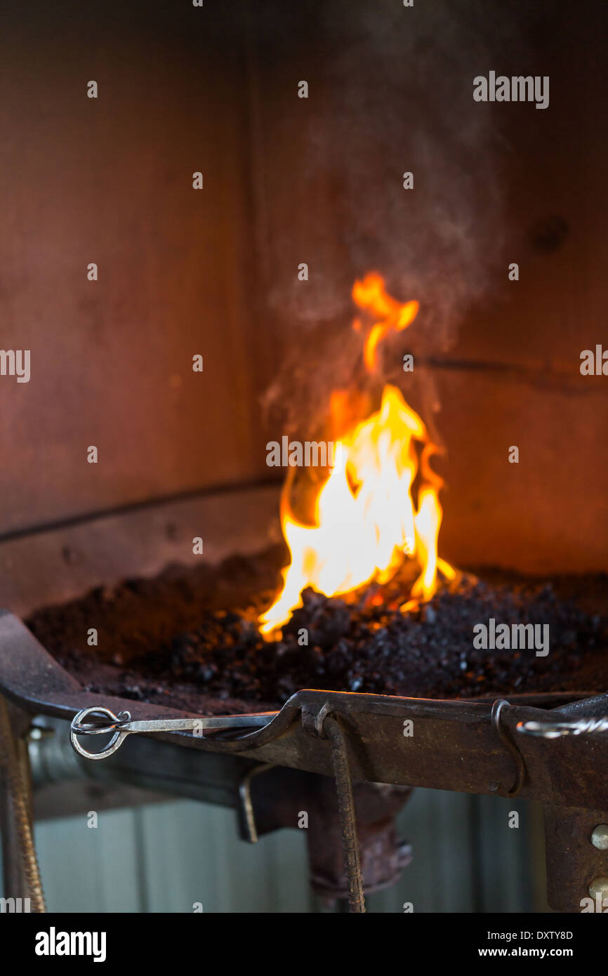 Working forge of the blacksmith in old shop Stock Photo - Alamy