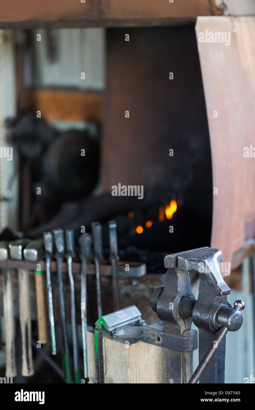 Working forge of the blacksmith in old shop Stock Photo - Alamy