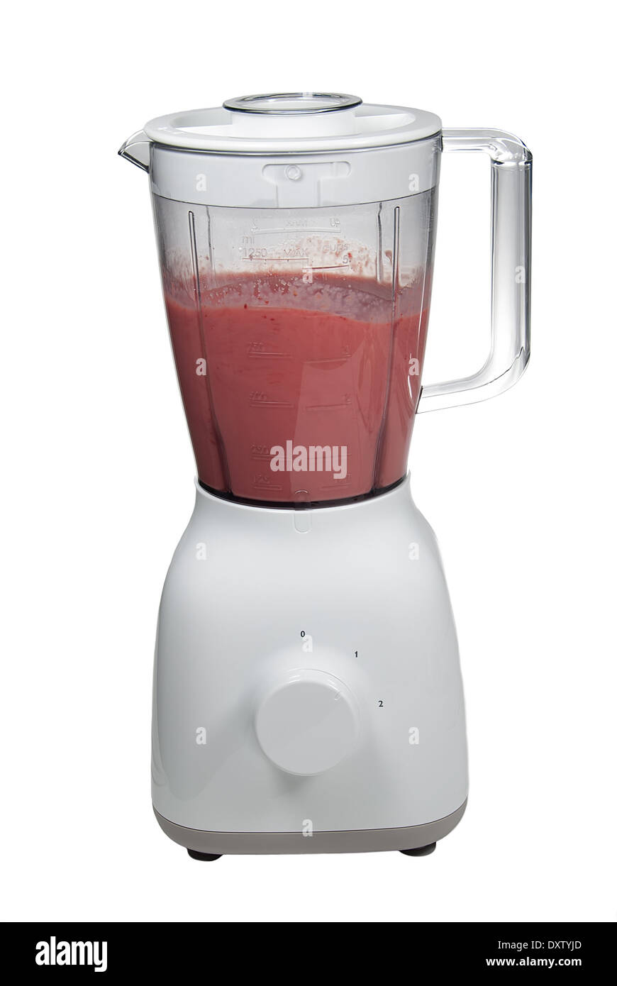 preparing a frozen strawberry smoothie in a blender Stock Photo - Alamy