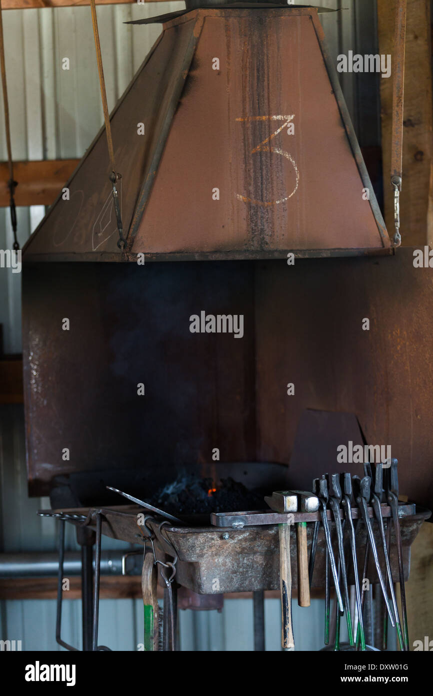 Working forge of the blacksmith in old shop Stock Photo - Alamy