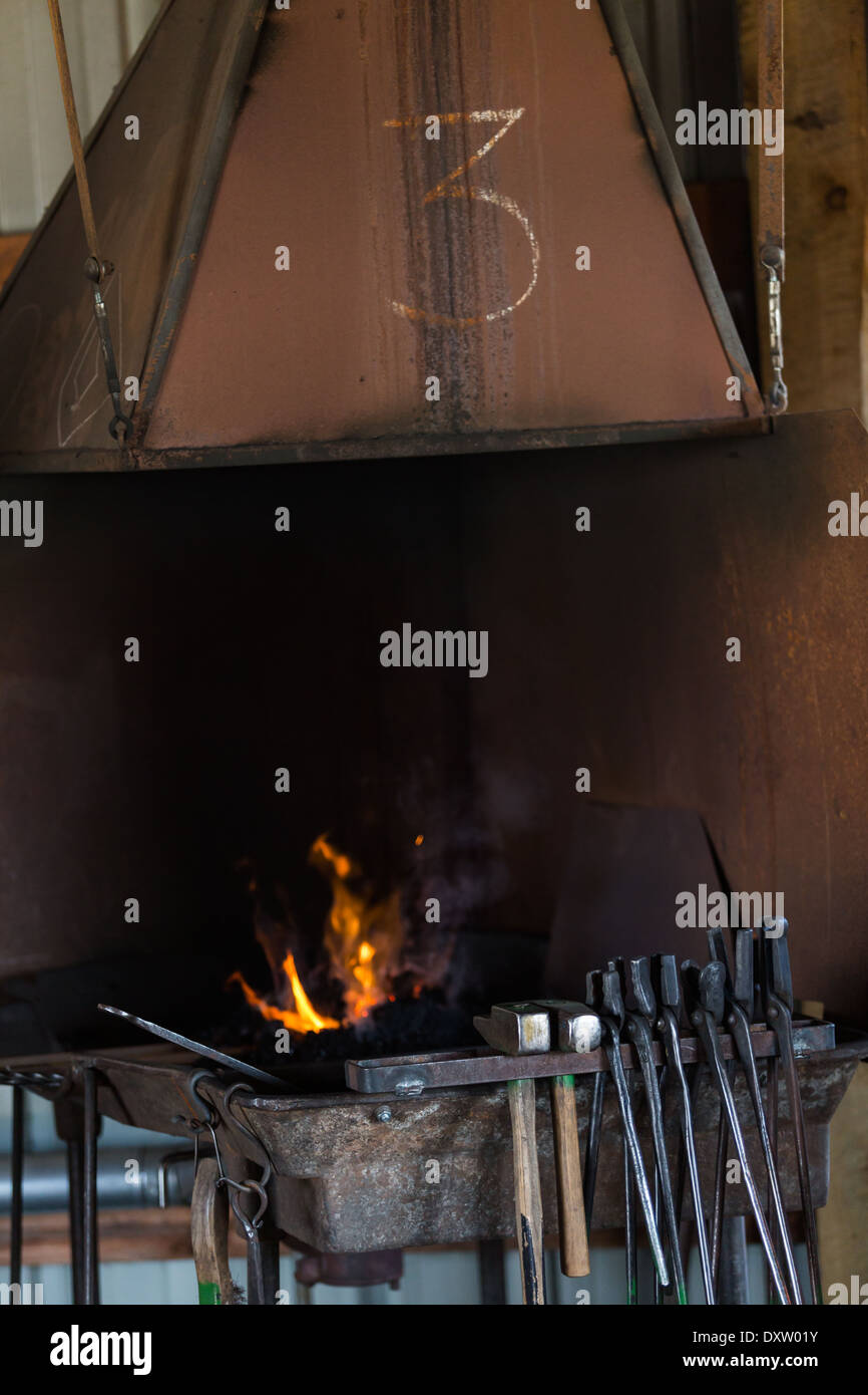 Working forge of the blacksmith in old shop Stock Photo - Alamy