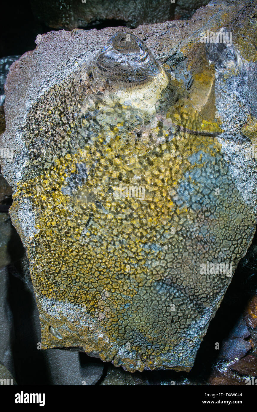 Crystal-clear ice stalagmites in the Leidarandi lava tube, Iceland ...