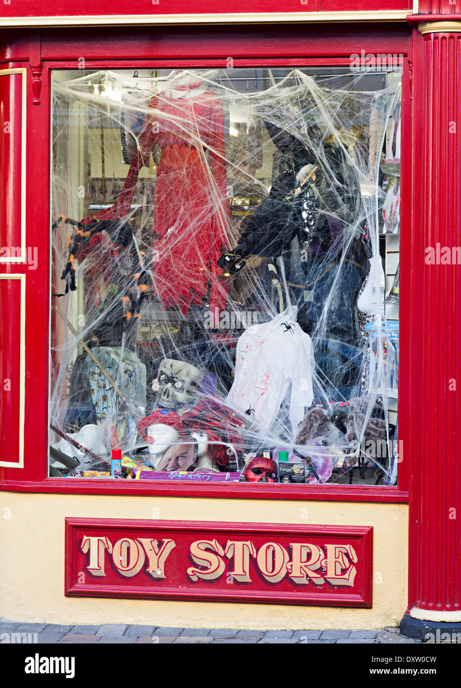 Toy Store shop window dressed with cobwebs for halloween, New Ross, Co ...