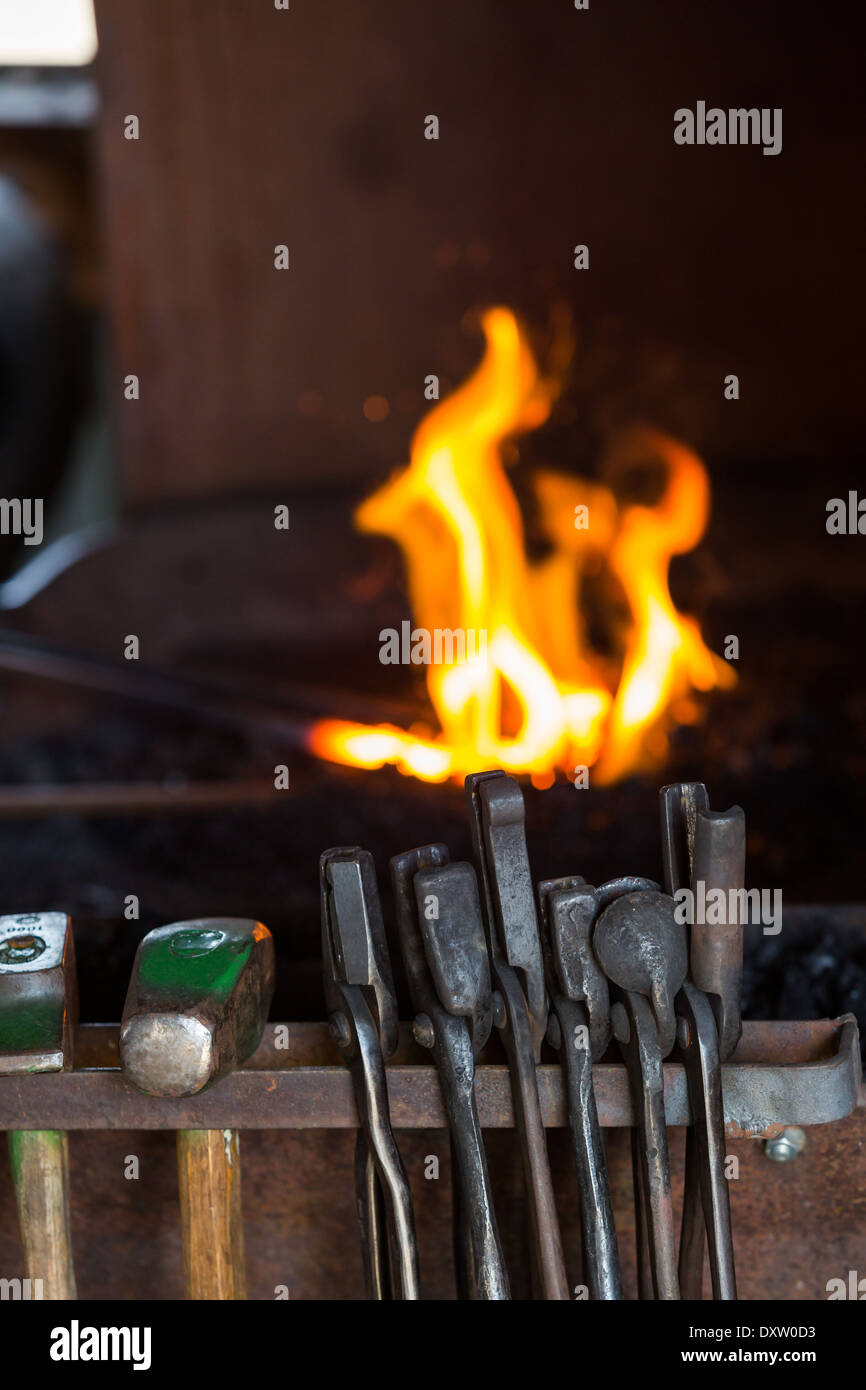 Working forge of the blacksmith in old shop Stock Photo - Alamy