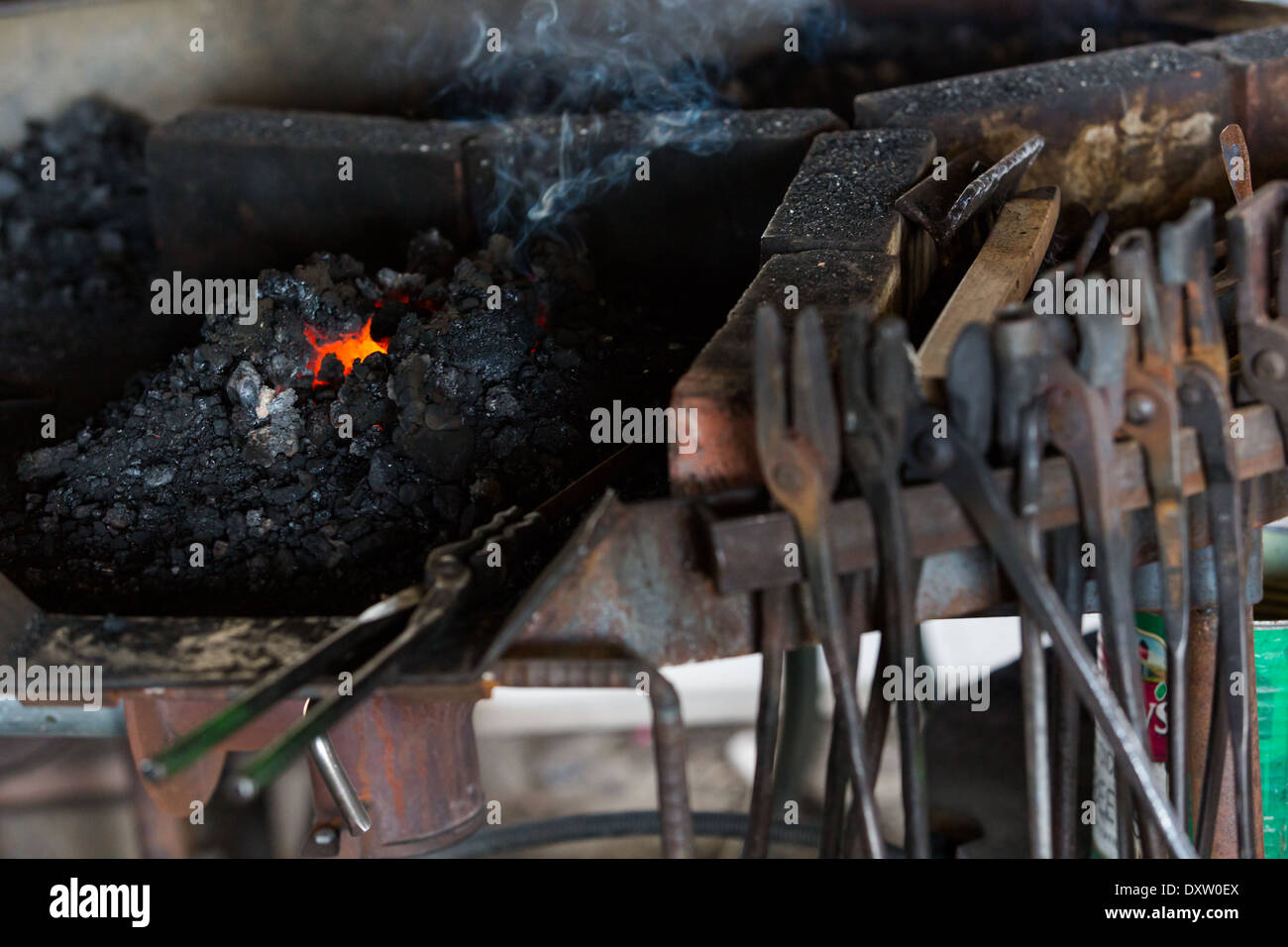 Working forge of the blacksmith in old shop Stock Photo - Alamy
