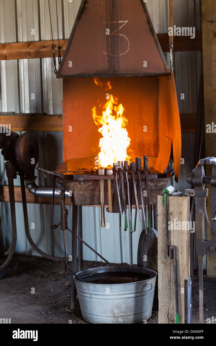 Working forge of the blacksmith in old shop Stock Photo - Alamy