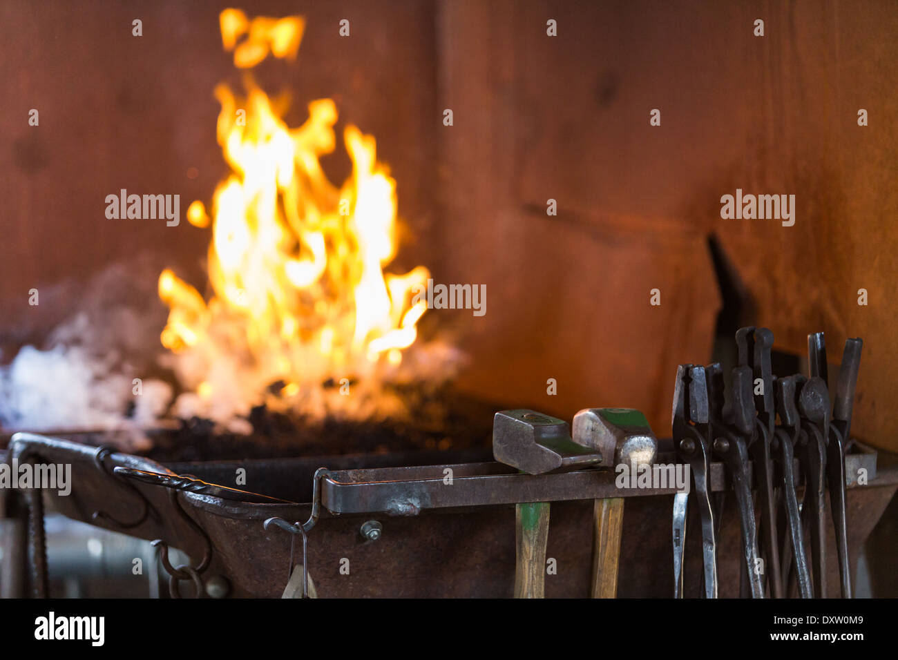 Working forge of the blacksmith in old shop Stock Photo - Alamy