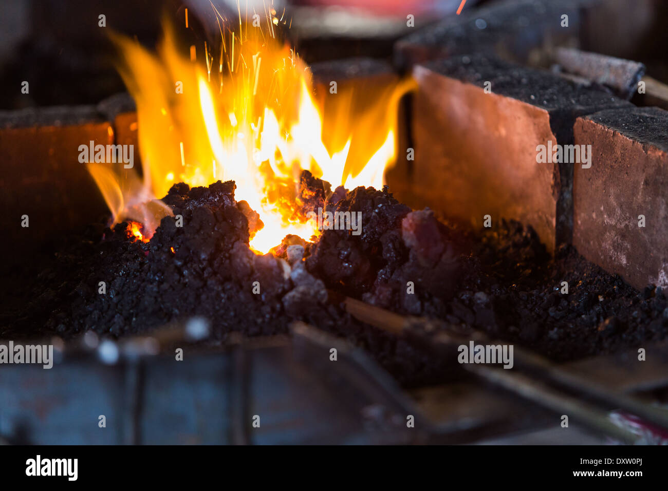 Working forge of the blacksmith in old shop Stock Photo - Alamy