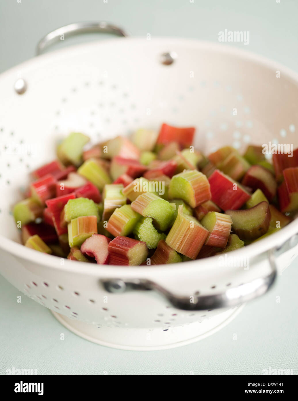 Chopped rhubarb in a colander Stock Photo - Alamy