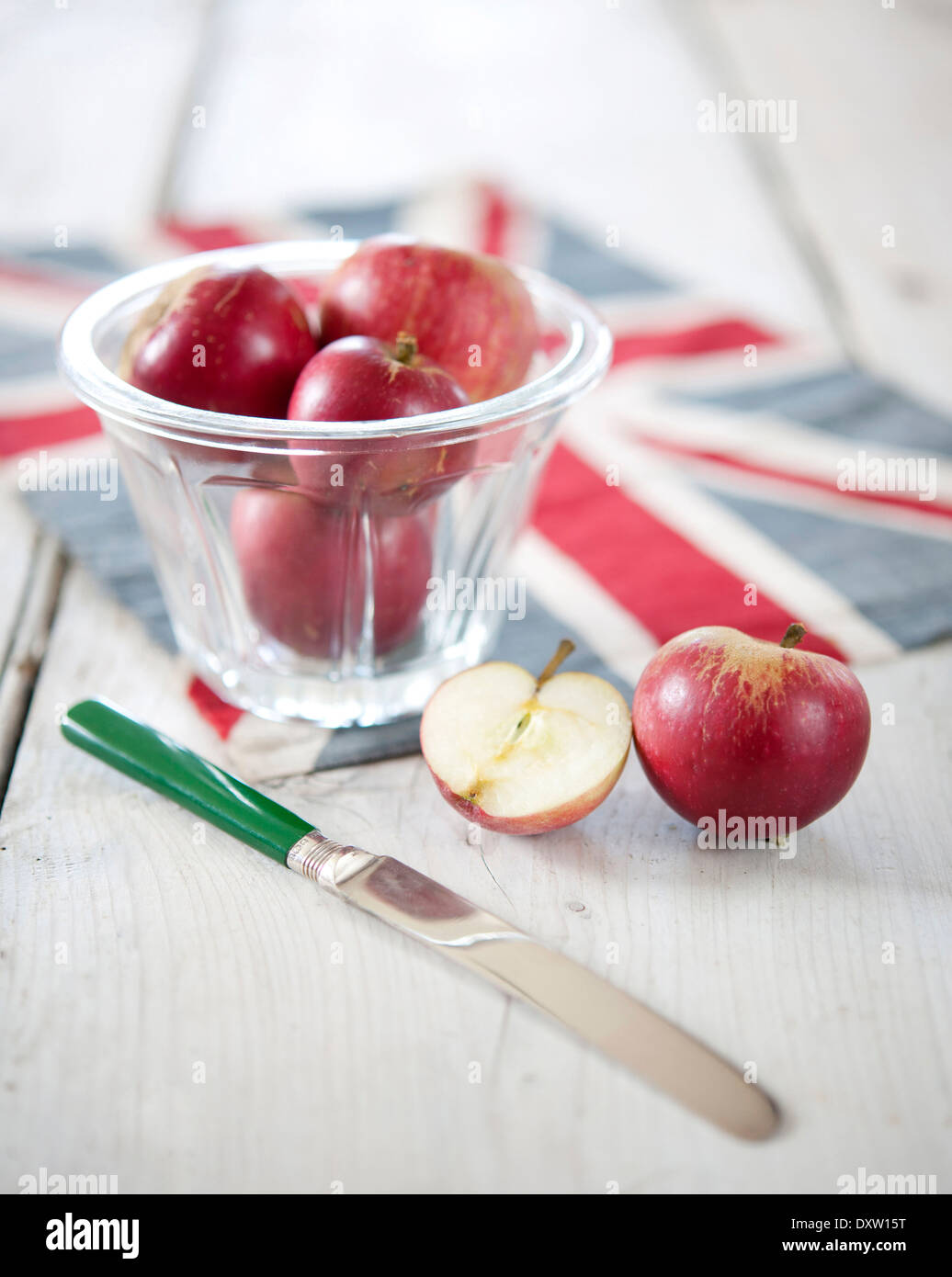 Mini red apples and the English flag Stock Photo - Alamy