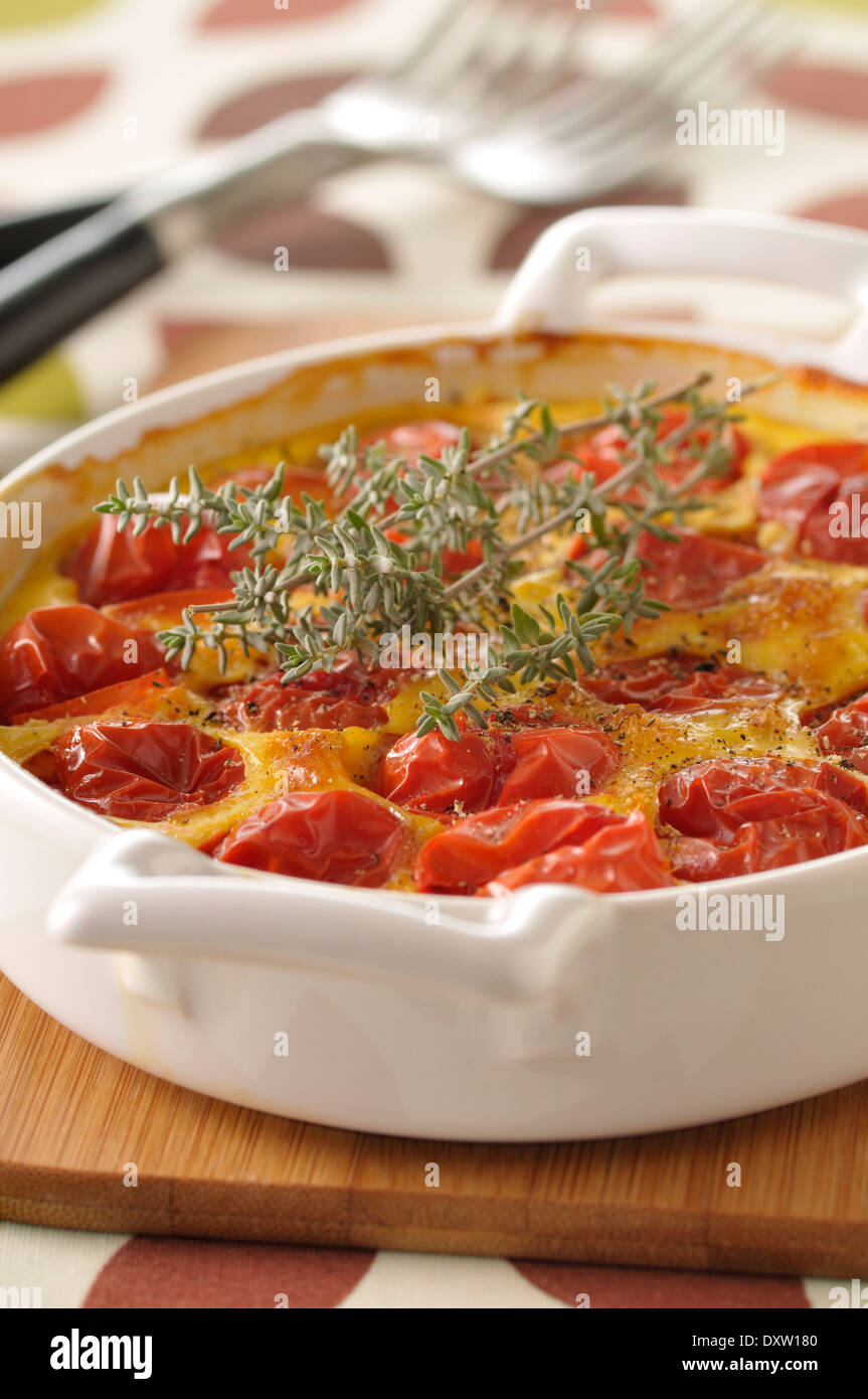 Cherry tomato,thyme and goat's cheese flan Stock Photo - Alamy