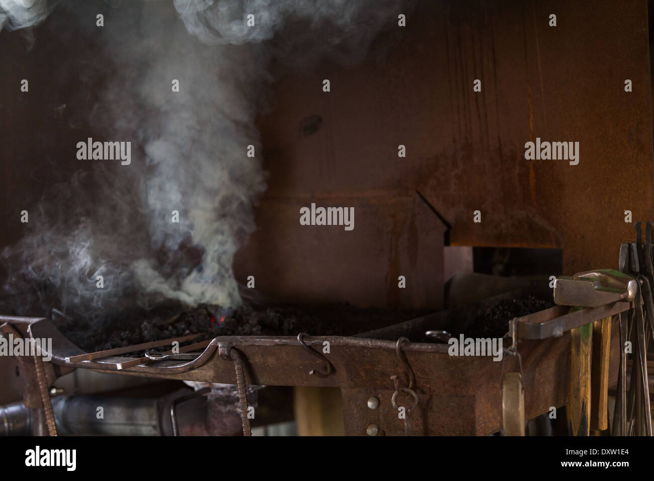 Working forge of the blacksmith in old shop Stock Photo - Alamy