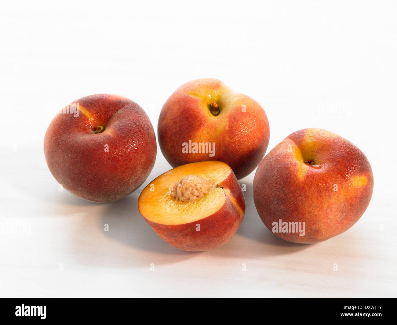 Wild peaches on a white background Stock Photo - Alamy