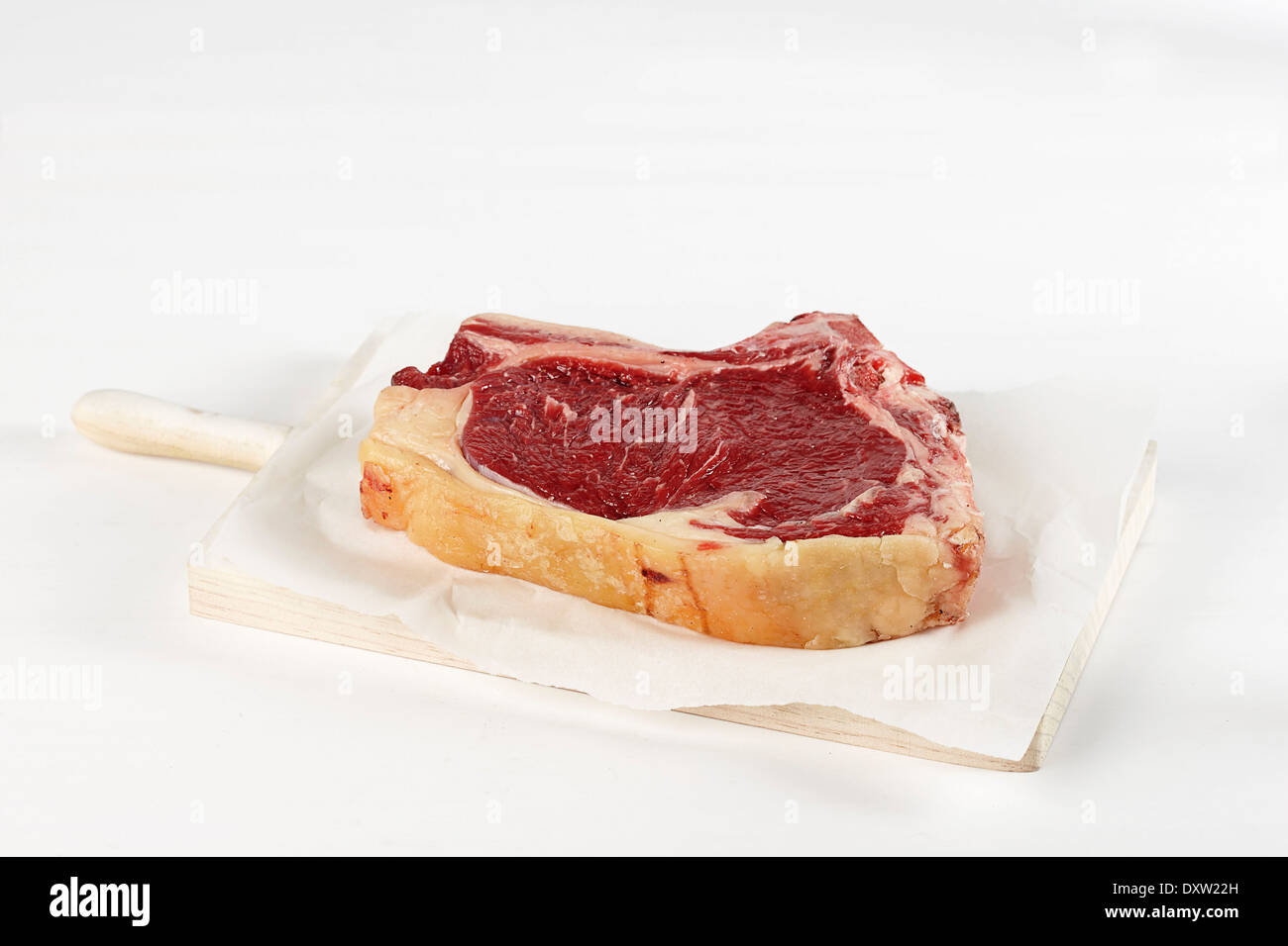 Raw beef chop Stock Photo - Alamy