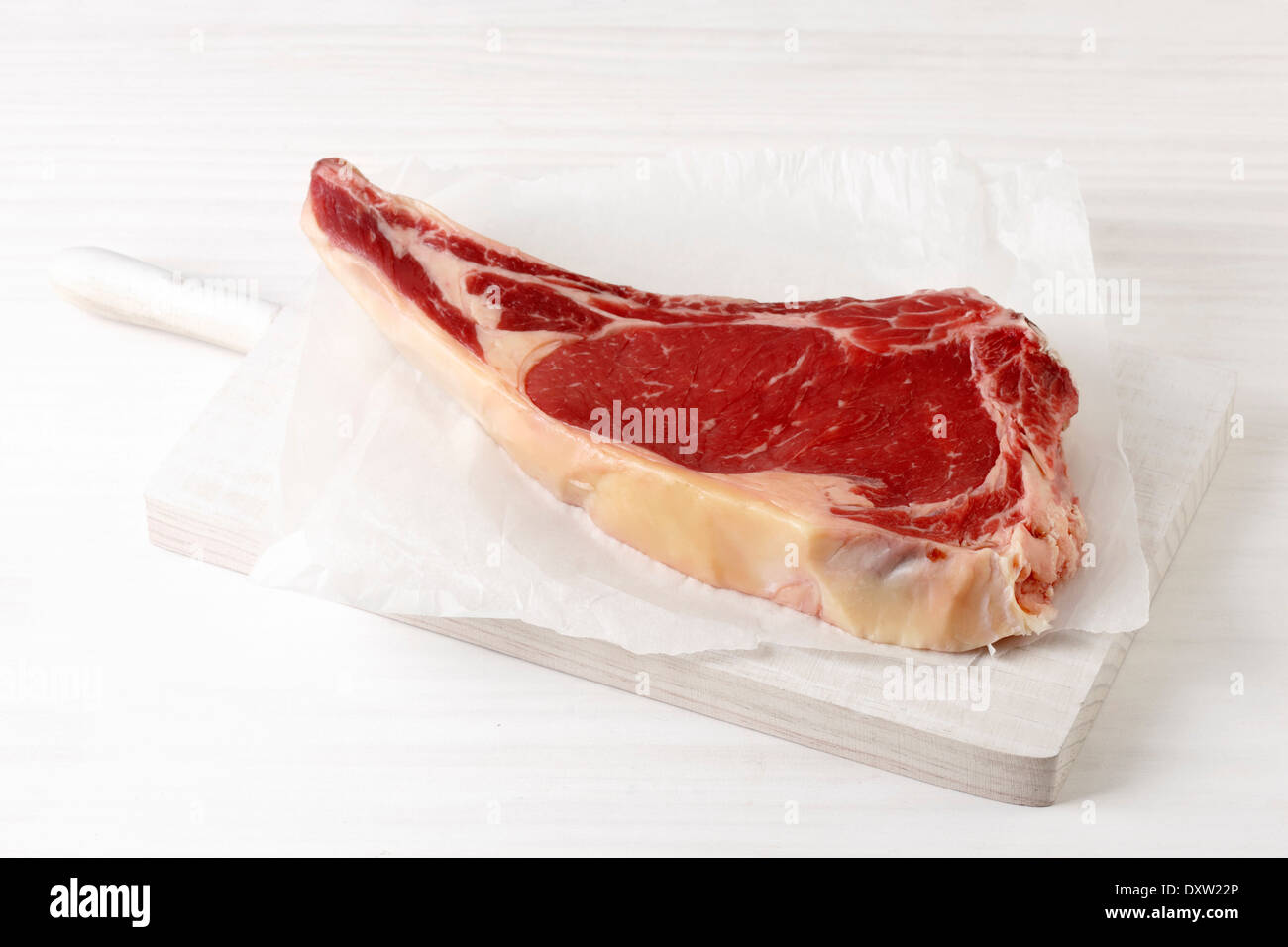 Raw beef chop Stock Photo - Alamy