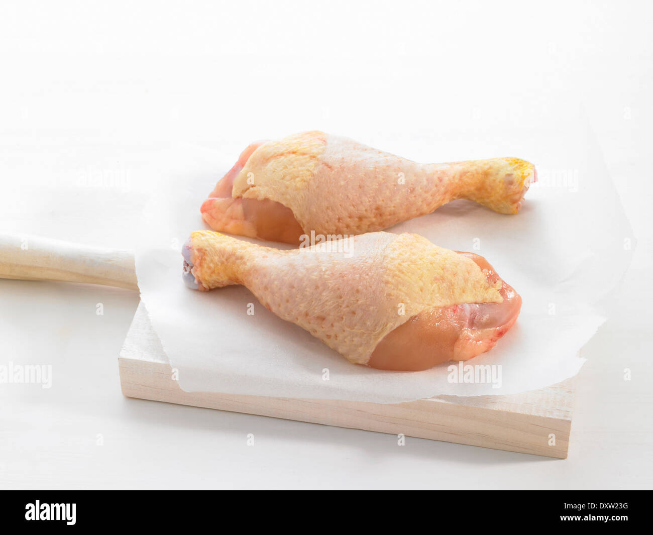 Free-range raw chicken legs with skin Stock Photo - Alamy
