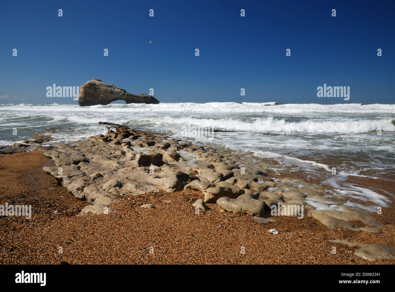 Ocean waves running on smooth rocks at the time of ebb Stock Photo - Alamy