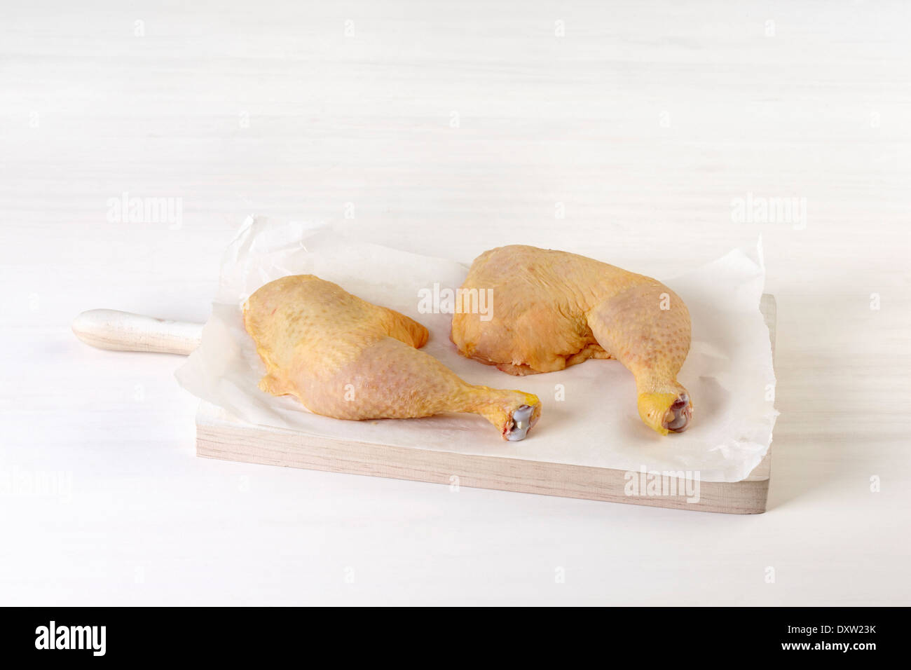 Free-range raw chicken legs with skin Stock Photo - Alamy