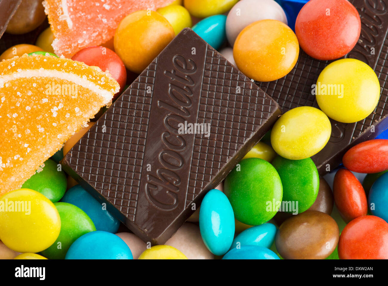 Mixed colorful sweets background Stock Photo - Alamy