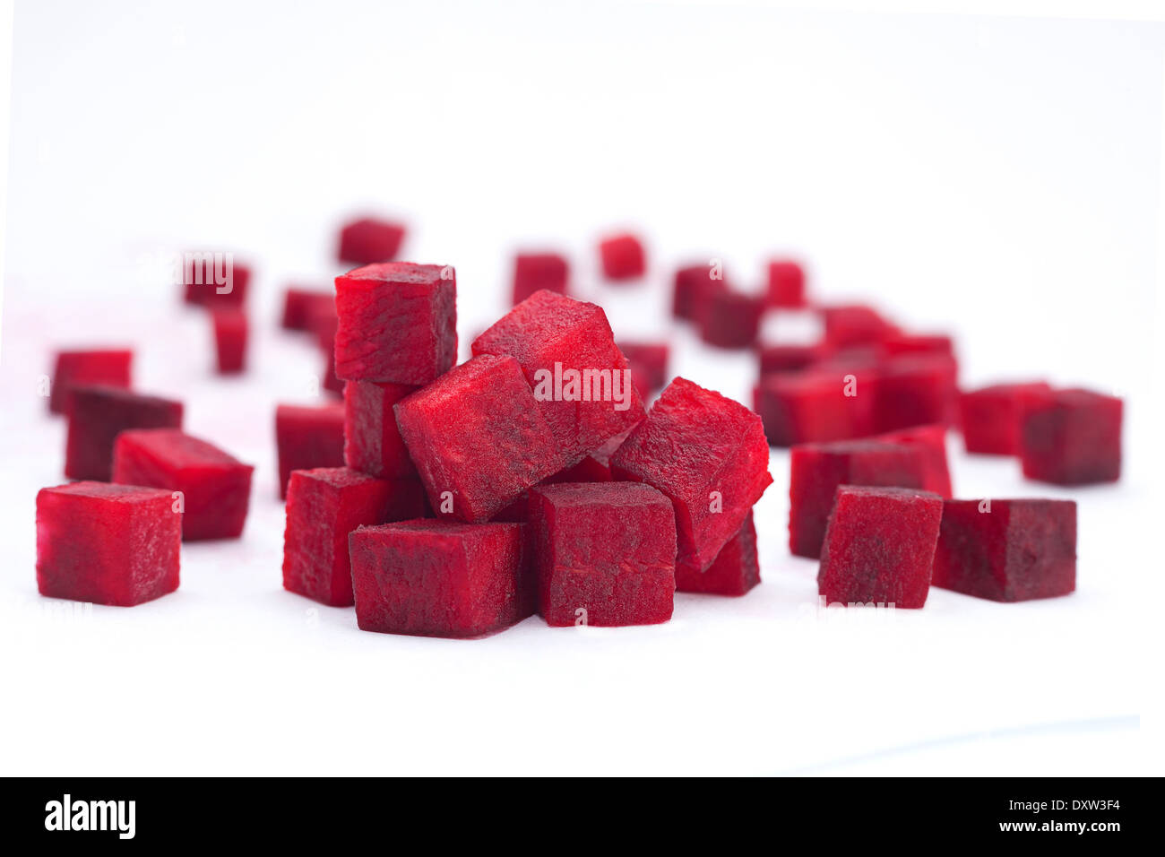 Beetroot cube slice closeup isolated on white background Stock Photo ...