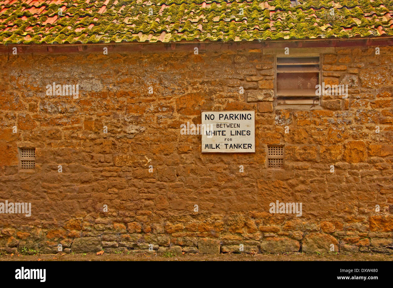 Informal sign and instructions on stone barn wall Stock Photo - Alamy