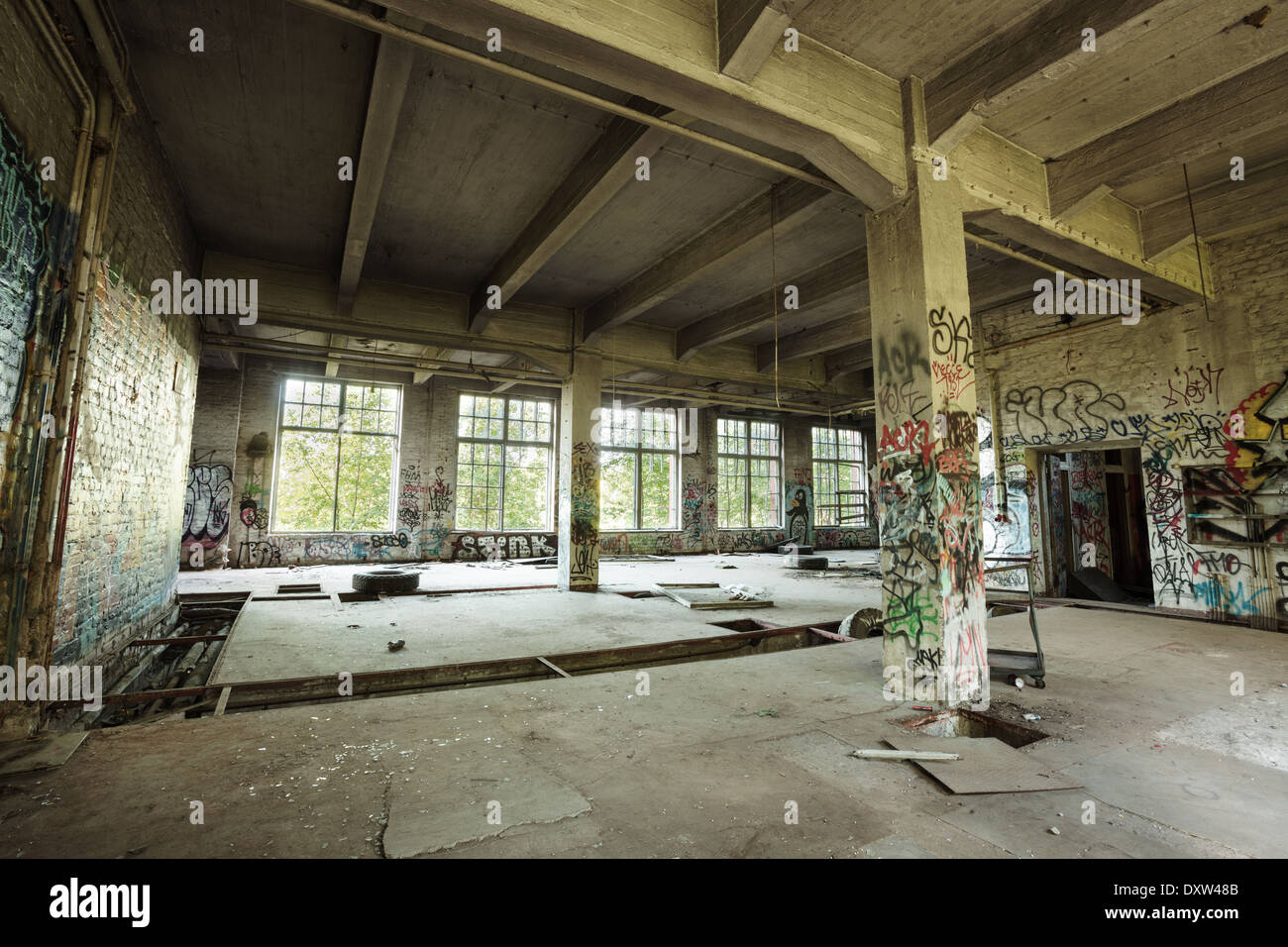 Empty abandoned factory room Stock Photo - Alamy