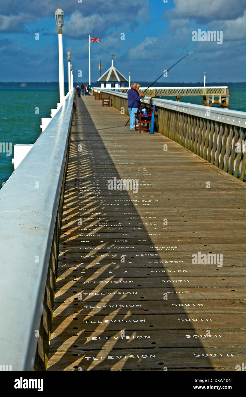 Timber jetty extending out into the Solent, from the Isle of Wight town ...