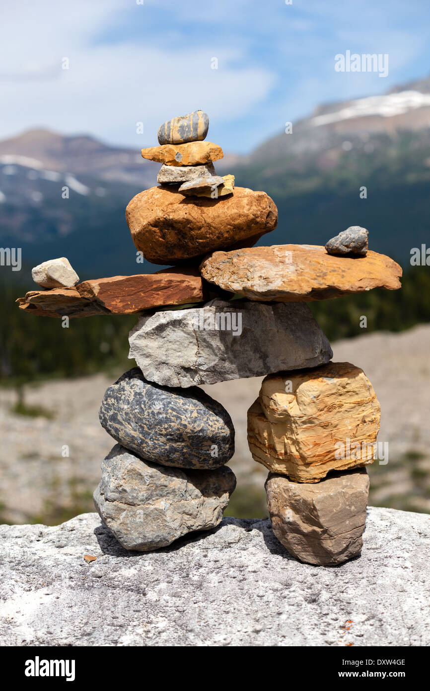 Inuksuk figure in the Canda rocky mountains Stock Photo - Alamy