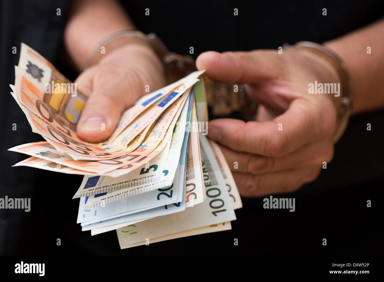 Europe police handcuffs black hi-res stock photography and images - Alamy