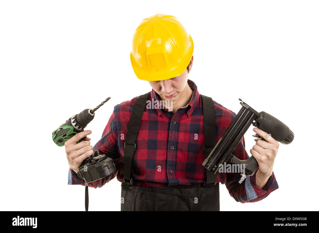 man with powertools on a white background Stock Photo - Alamy