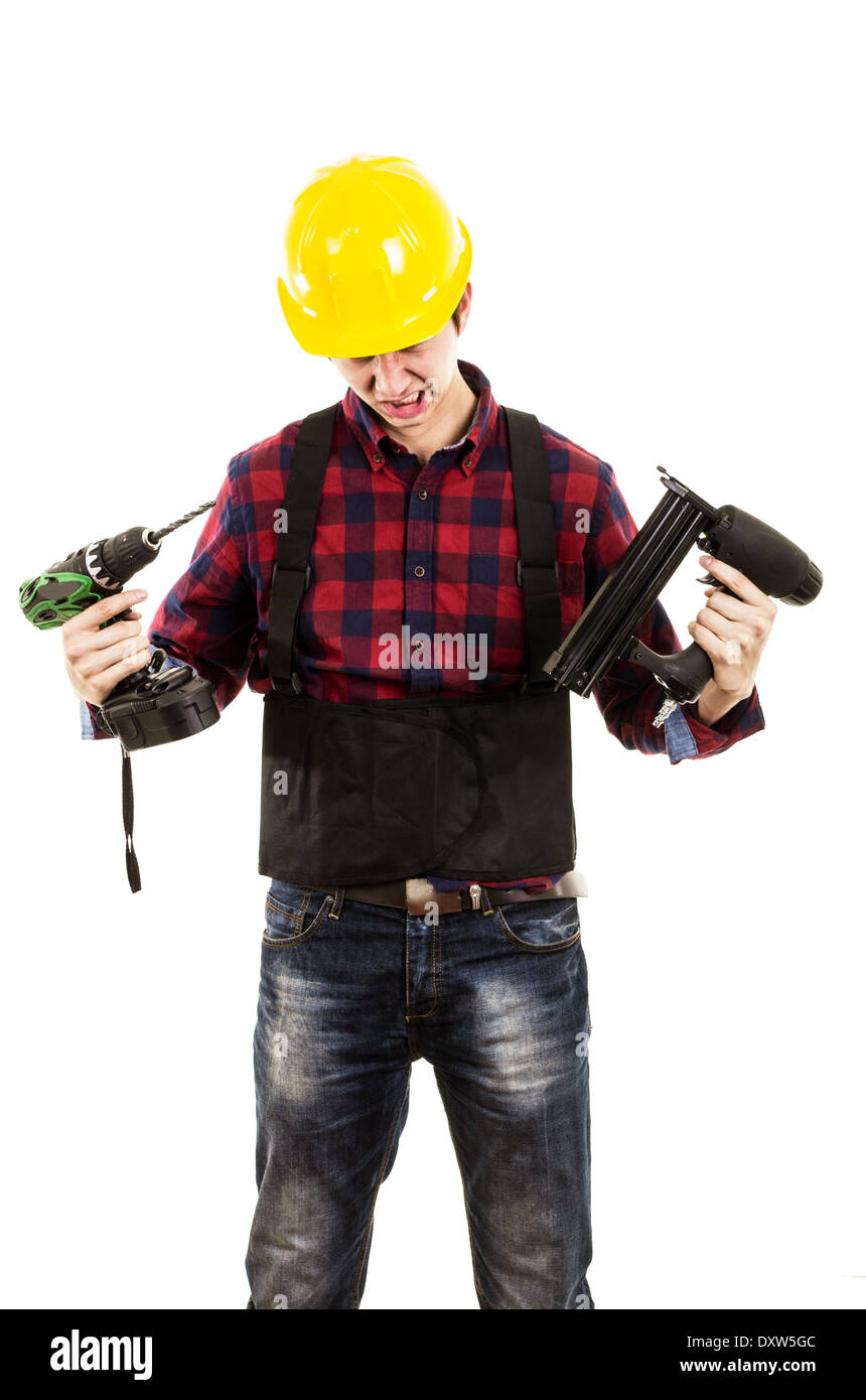 man with powertools on a white background Stock Photo - Alamy
