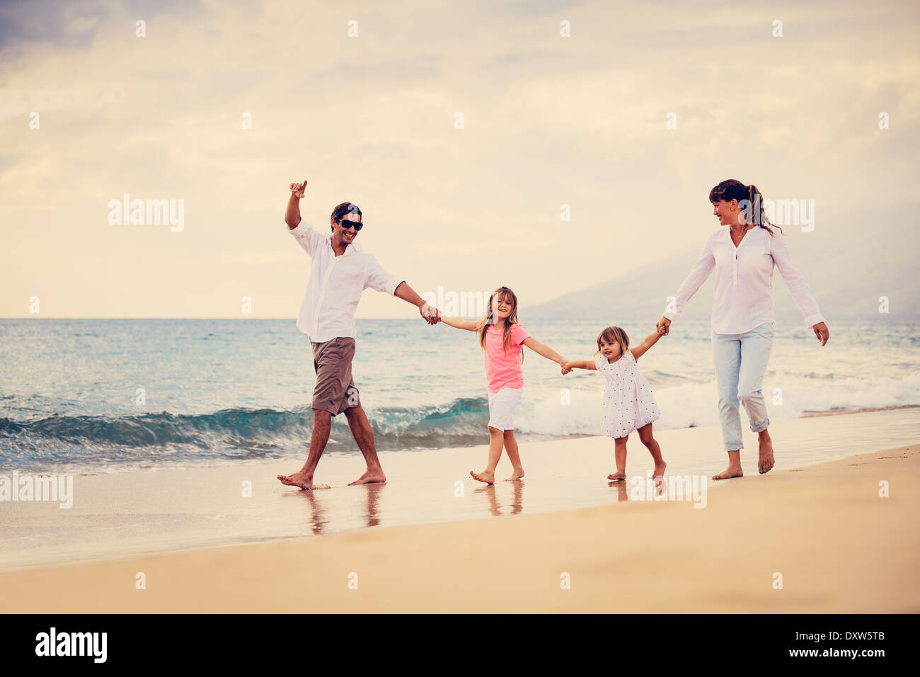 Family beach fun hi-res stock photography and images - Alamy