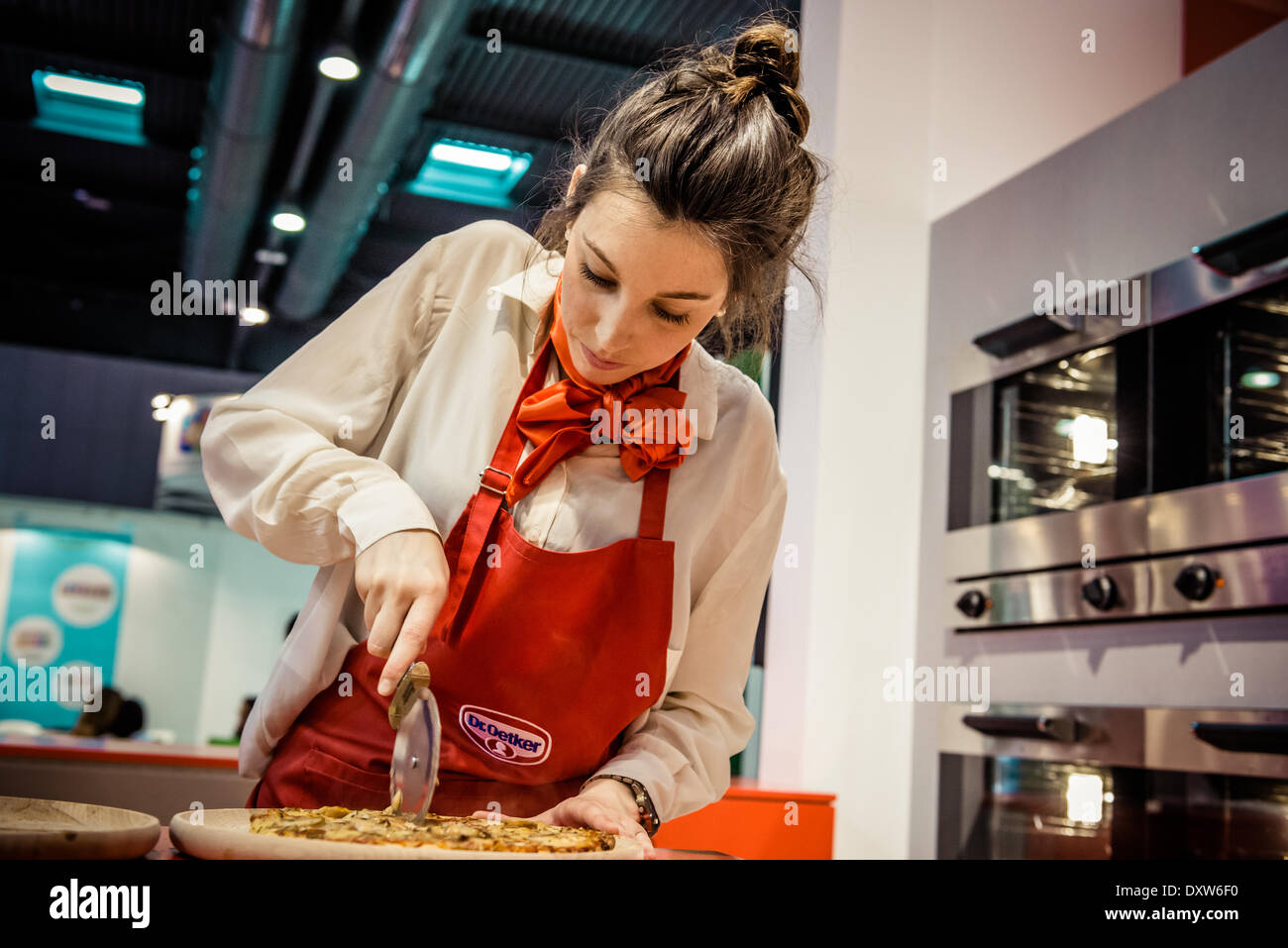 Barcelona, Spain. March 31st, 2014: A hostess at the "DrOetker ...