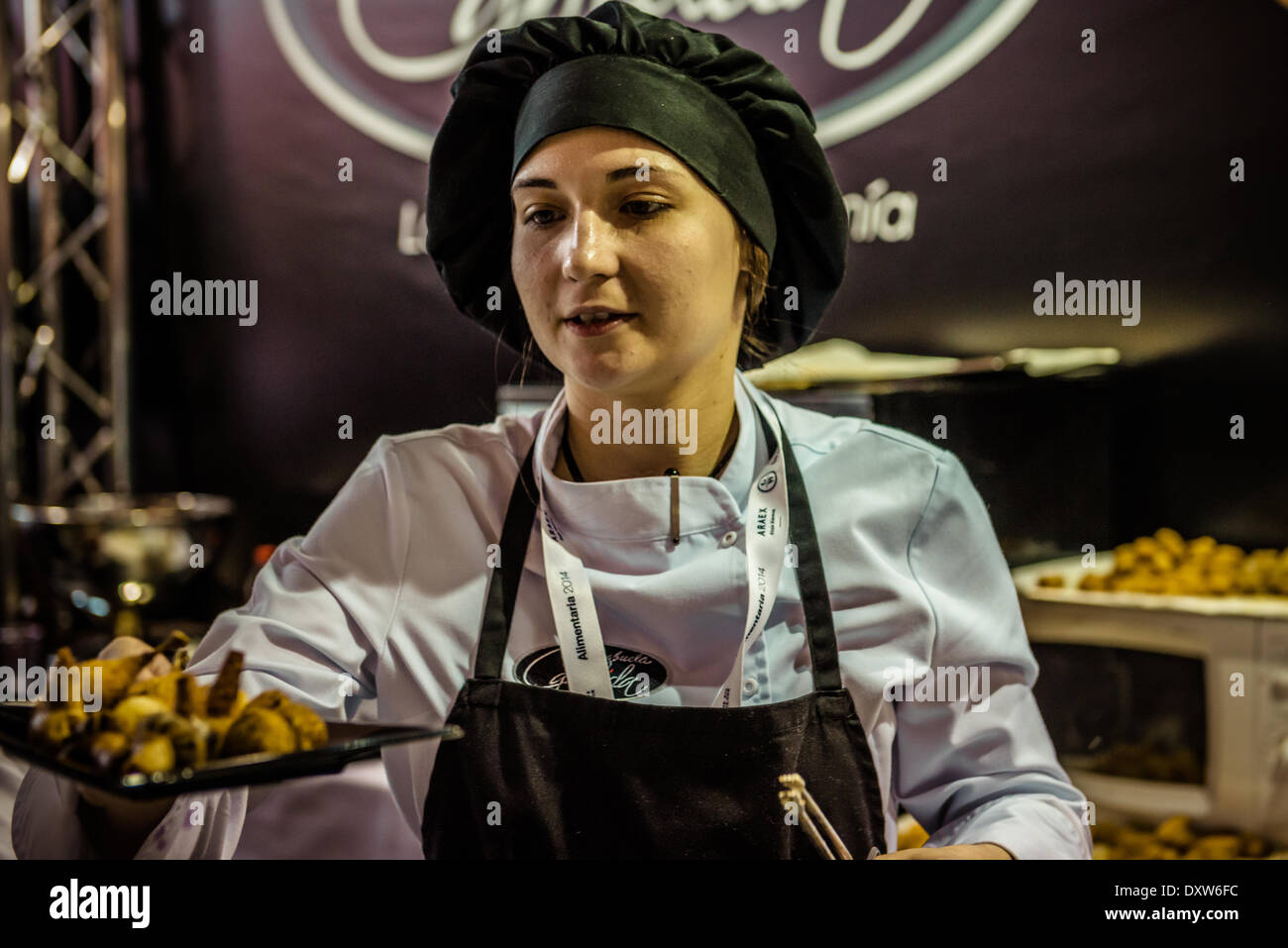 Barcelona, Spain. March 31st, 2014: A hostess from "La Abuela Candida ...