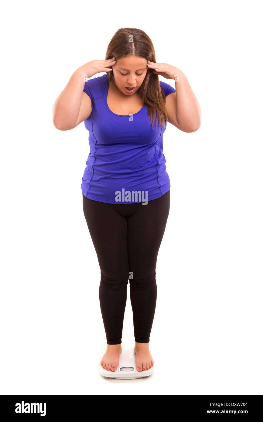 Fat woman very worried with her weight Stock Photo - Alamy