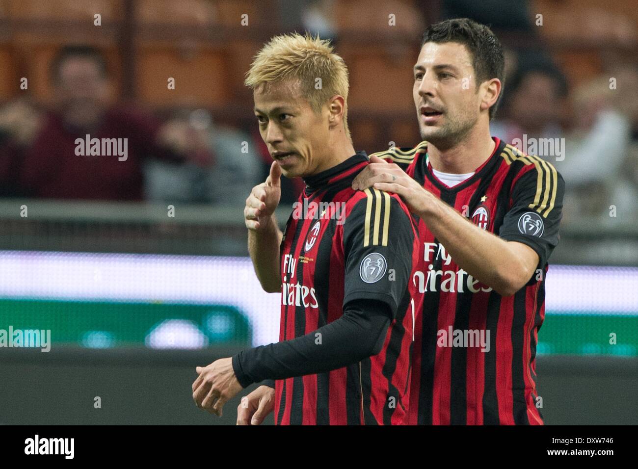 Milan, Italy. 29th Mar, 2014. (L-R) Keisuke Honda, Daniele Bonera ...