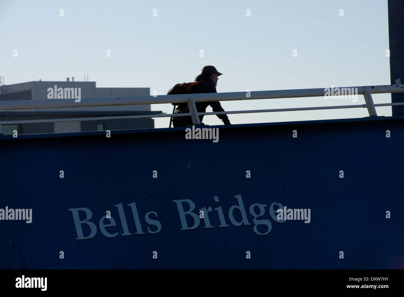 A Cyclist crosses the Bell's Bridge in Glasgow Stock Photo - Alamy