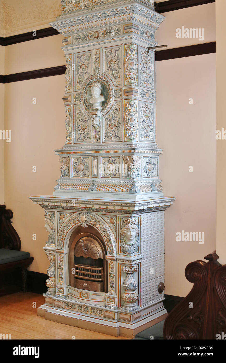 An ornate antique tiled chimney stove in the Turnblad mansion at the ...