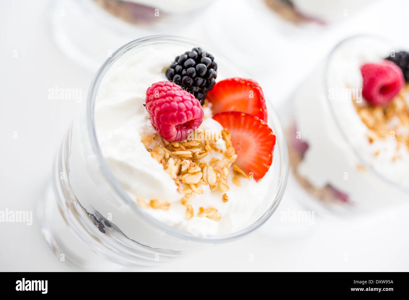 Breakfast parfait made from Greek yogurt and granola topped with fresh ...