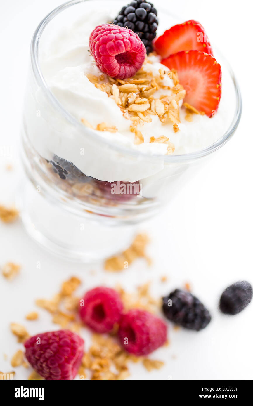 Breakfast parfait made from Greek yogurt and granola topped with fresh ...