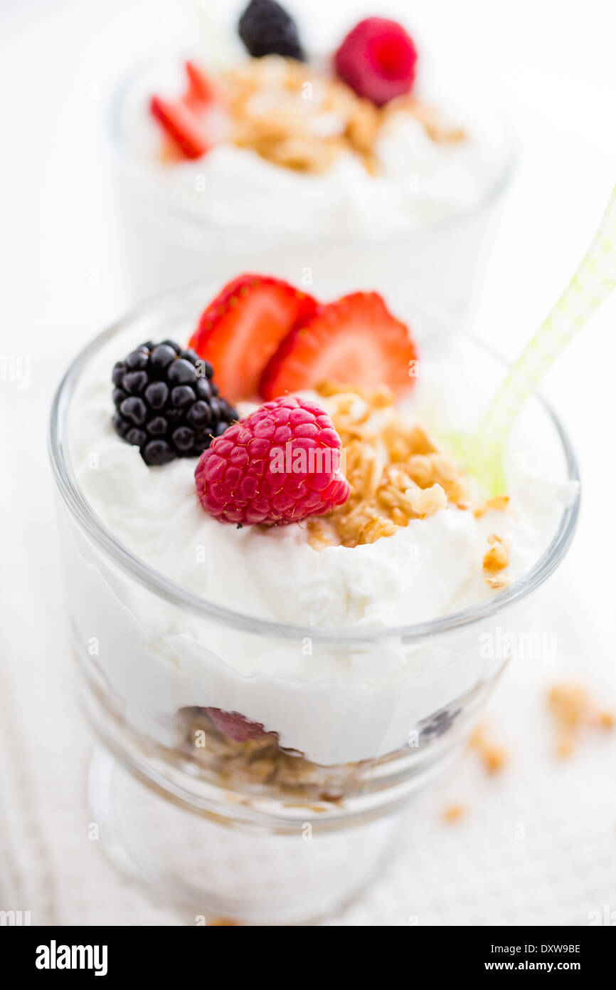 Breakfast parfait made from Greek yogurt and granola topped with fresh ...
